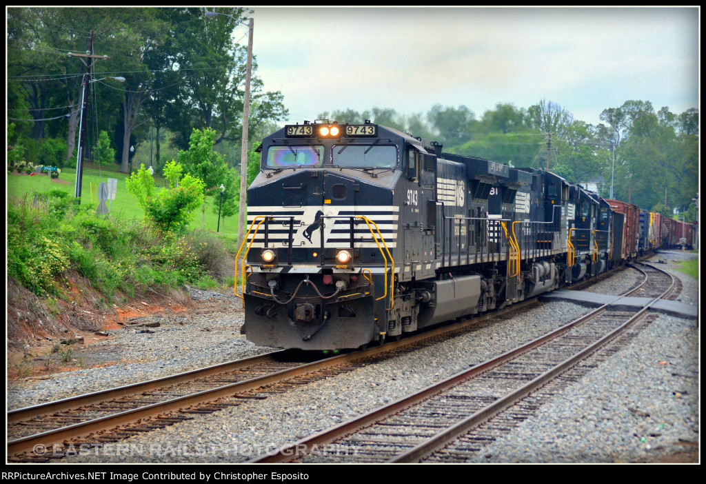 NS 9-40CW 9743 leads 337 down the R Line